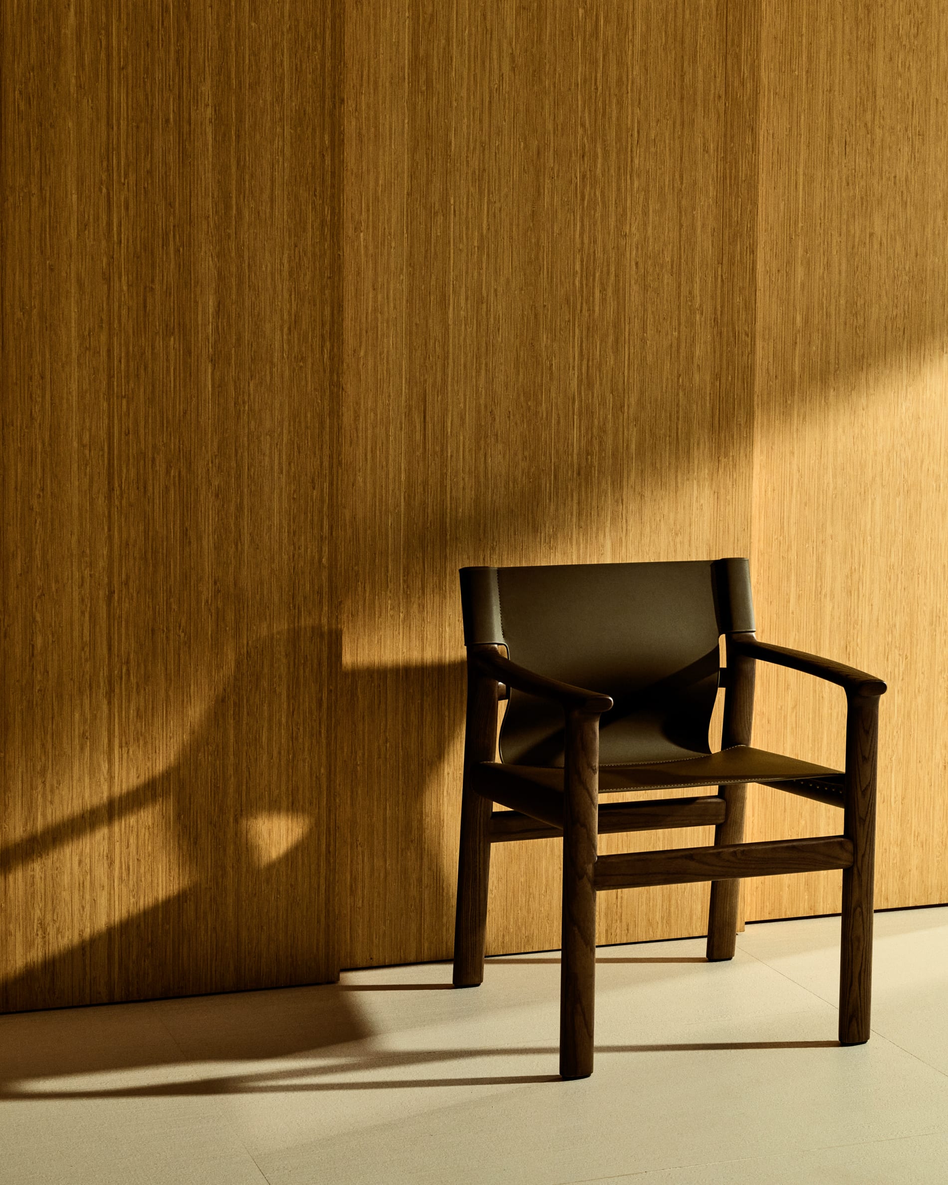 Jan chair made of dark brown recycled leather fibres and FSC 100% solid ...
