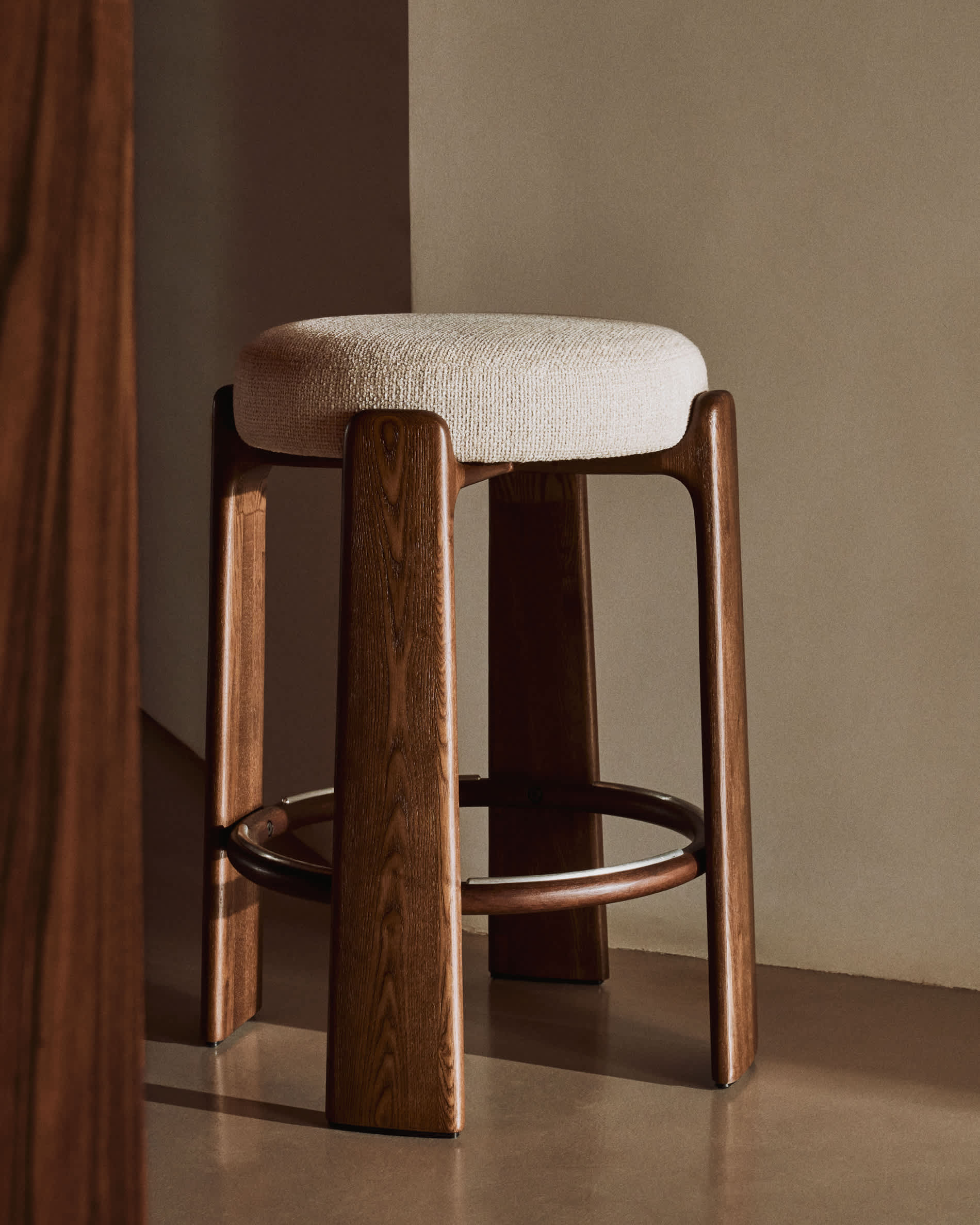 Granite stool in beige chenille and solid ash wood with walnut-coloured ...