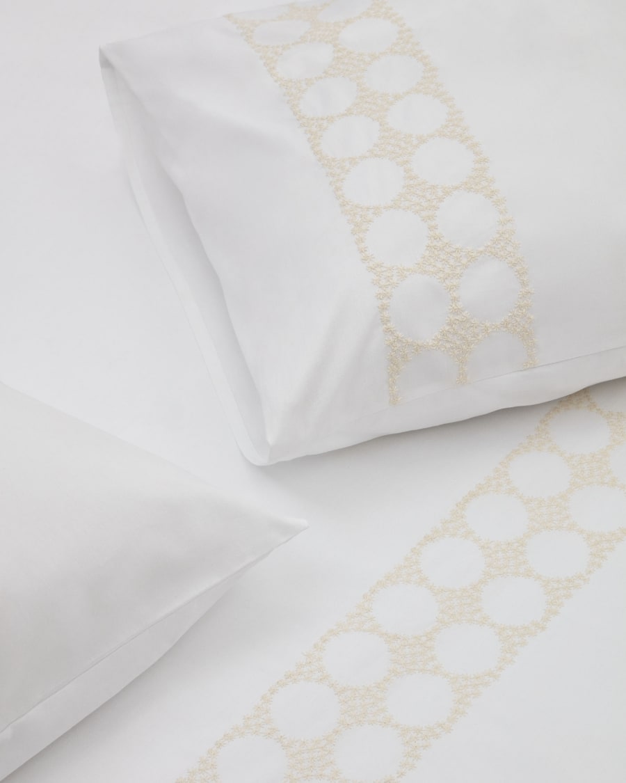 Teia cotton percale duvet cover and pillowcase set in white with floral ...